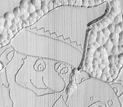 Rout pictures and letters into wood using the router