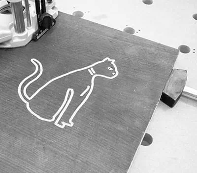 Rout pictures and letters into wood using the router